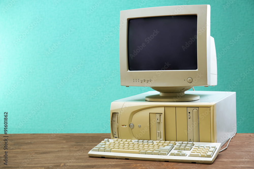 Obsolete computer set on light blue background Stock Photo | Adobe Stock