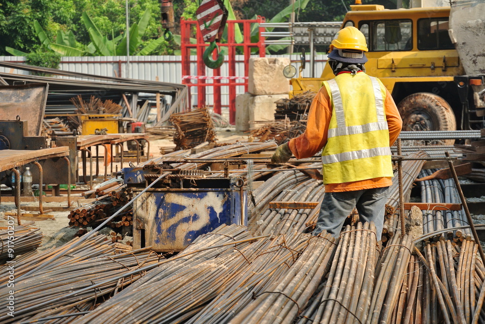 Construction workers working at the bar bending yard Stock Photo ...