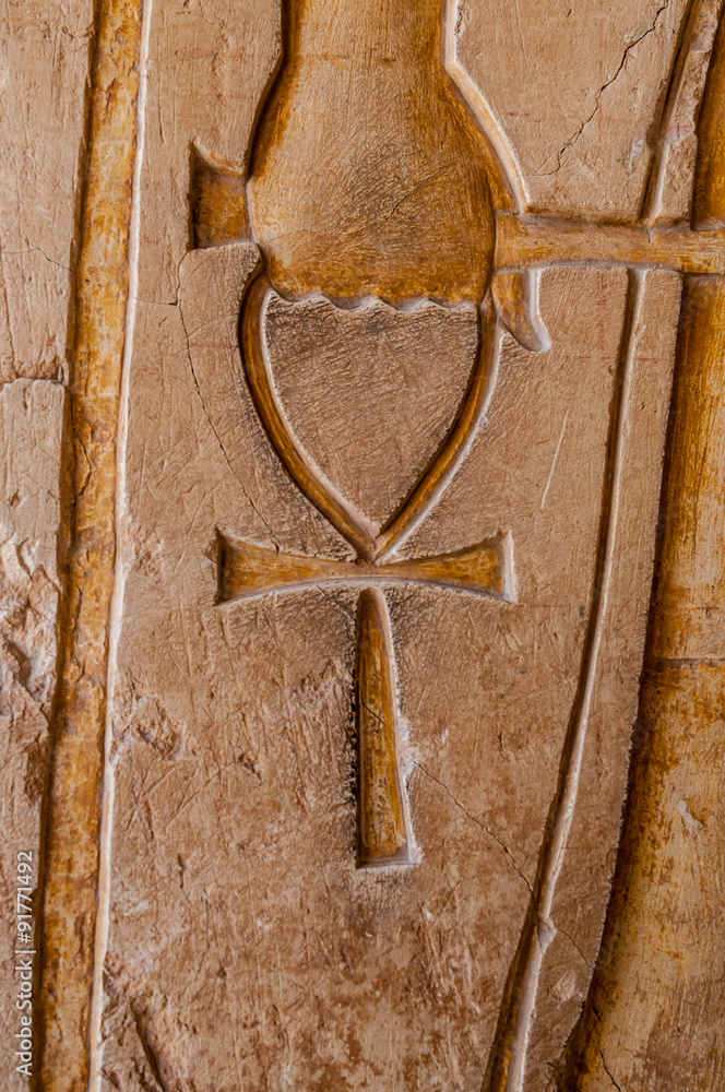 Foto de Key of life or ankh symbol carved in stone in Egypt. do Stock ...