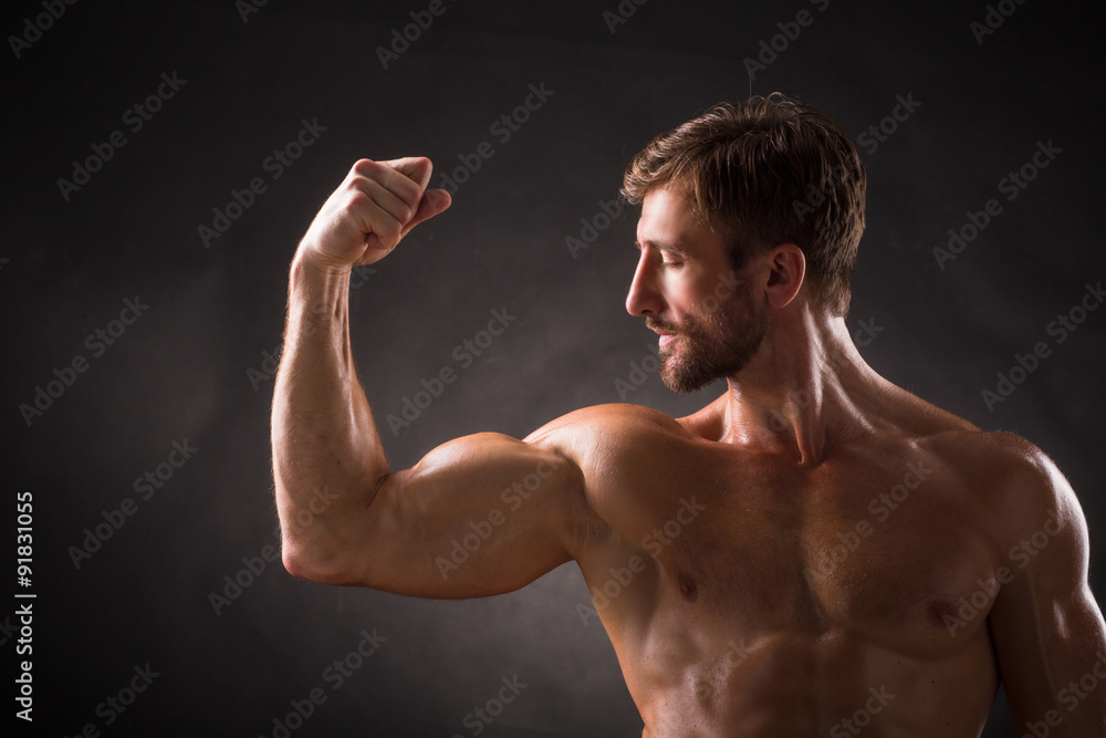Bodybuilder's biceps Stock Photo | Adobe Stock