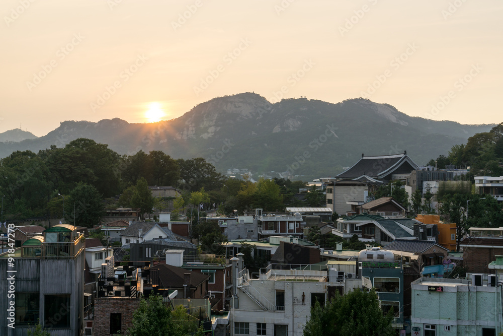 samcheongdong sunset view taken from bukchon hanok village in seoul ...