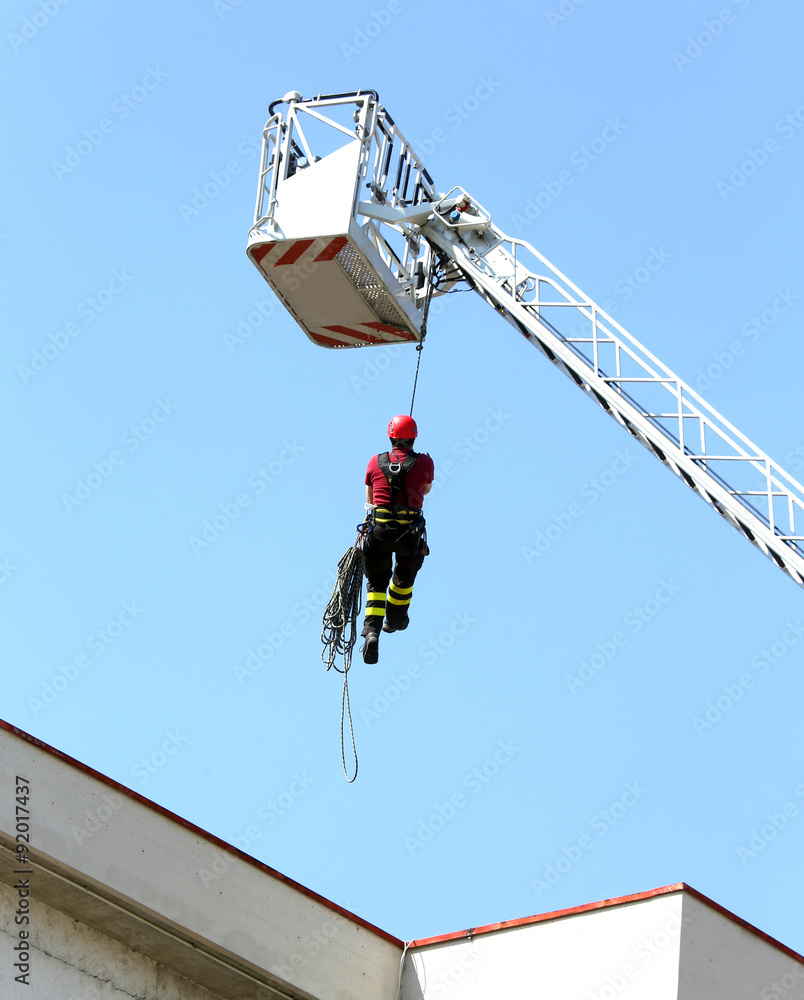 firefighter down with the rope in the building during a fire ala Stock ...