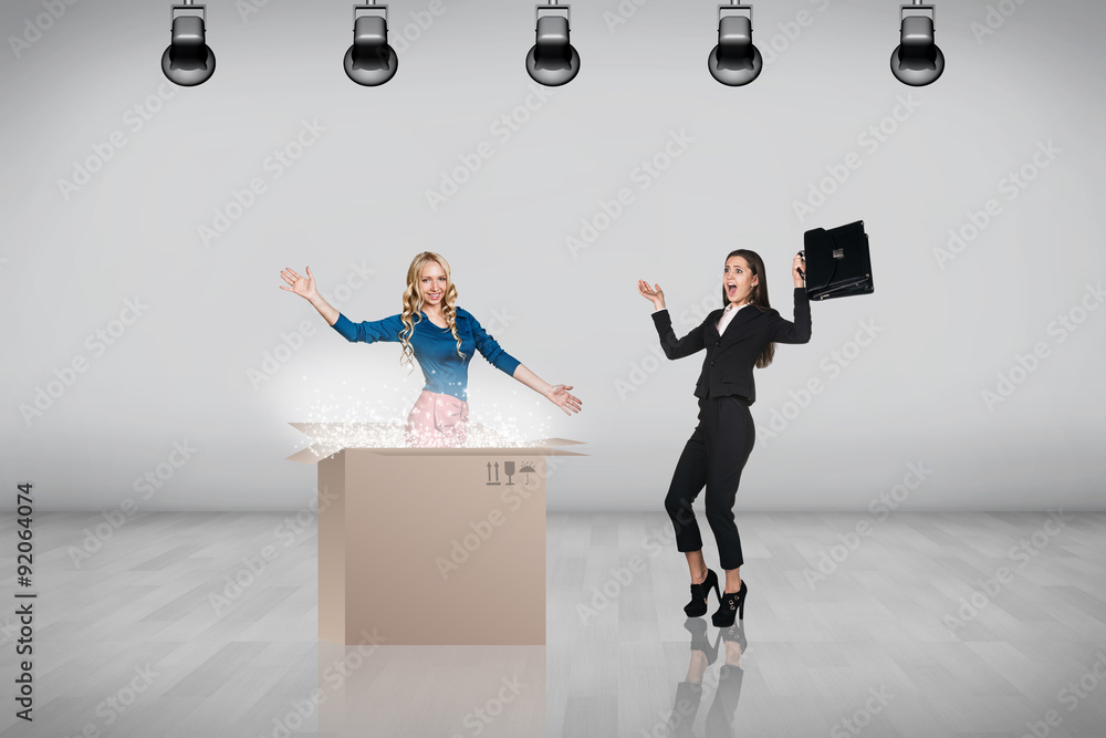 Beautiful girl inside a cardboard box Stock Photo | Adobe Stock