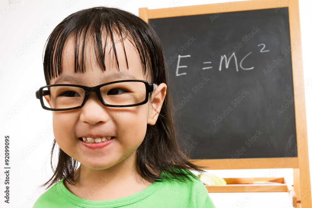 Asian Chinese little girl againts blackboard with formulas Stock Photo ...