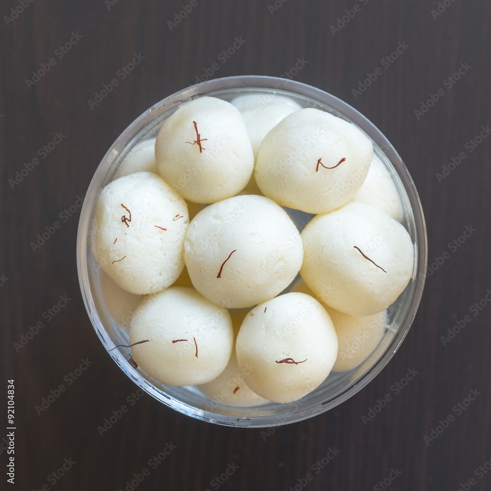 Indian sweetn Rasgulla is a syrupy dessert popular in the Indian ...