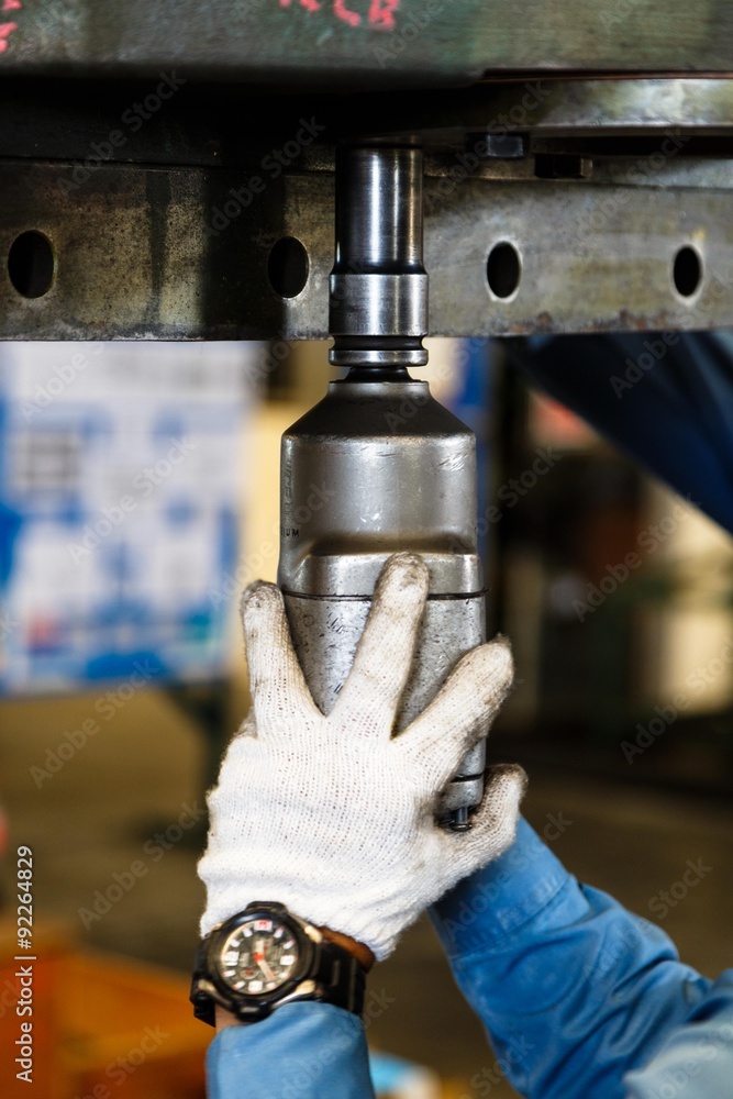 Technician use pneumatic torque wrench for tighten bolt Stock Photo ...