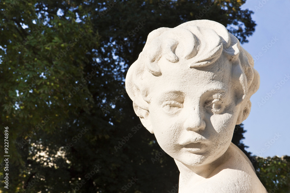 Statue of a child; more than 100 years old statue Stock Photo | Adobe Stock