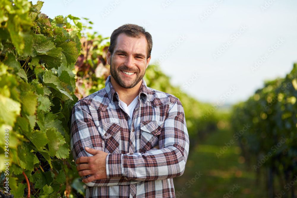 Winemaker in vineyard Stock Photo | Adobe Stock