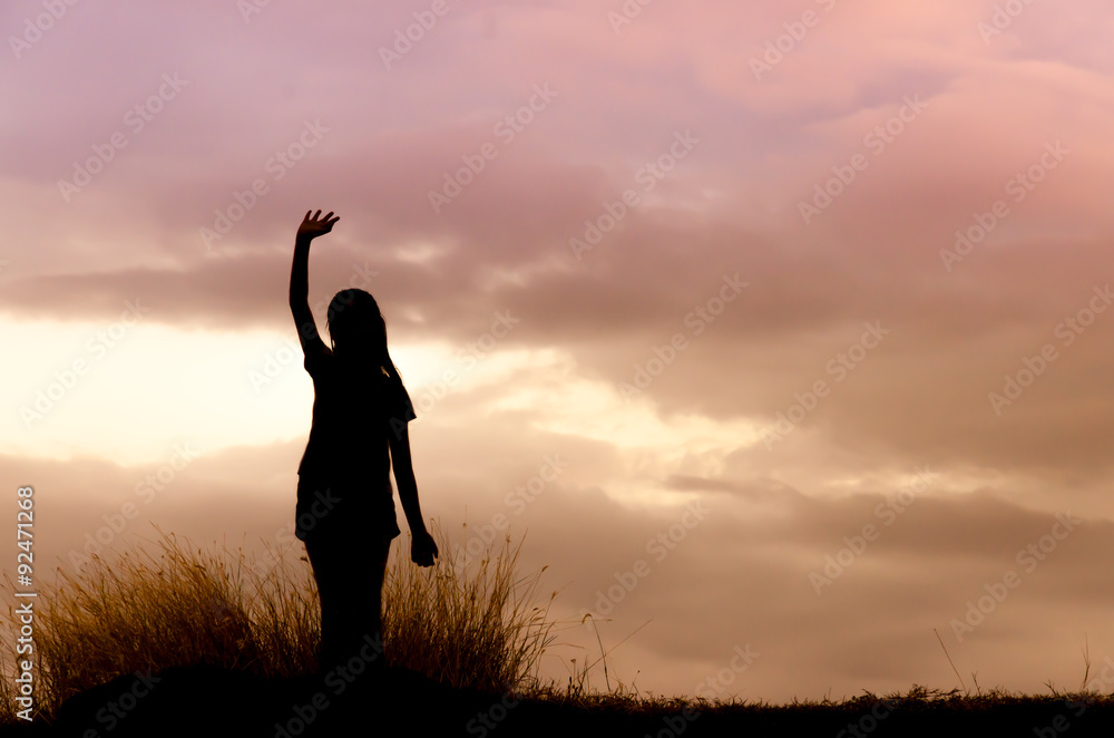 Woman Standing Alone In Field