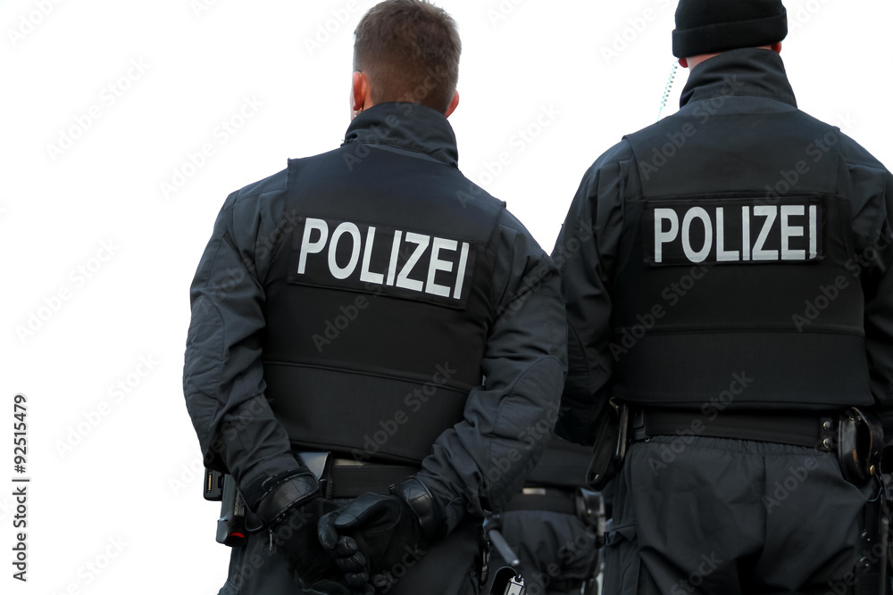 Abwartende deutsche Polizisten im Einsatz Stock-Foto | Adobe Stock