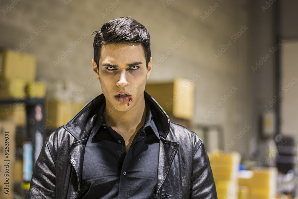Young Vampire Man Face with Blood on his Mouth Stock Photo | Adobe Stock