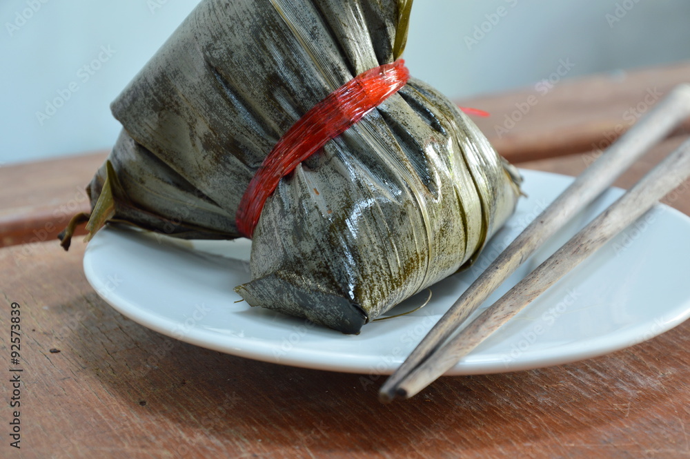 sticky rice steam with pork and salt egg in banana leaf of Chinese ...