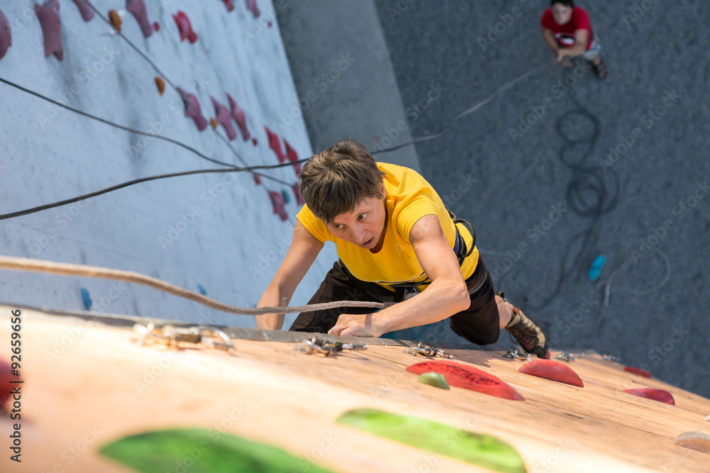Aged Woman Climbing Wall Elderly Female Demonstrates Excellent Physical ...