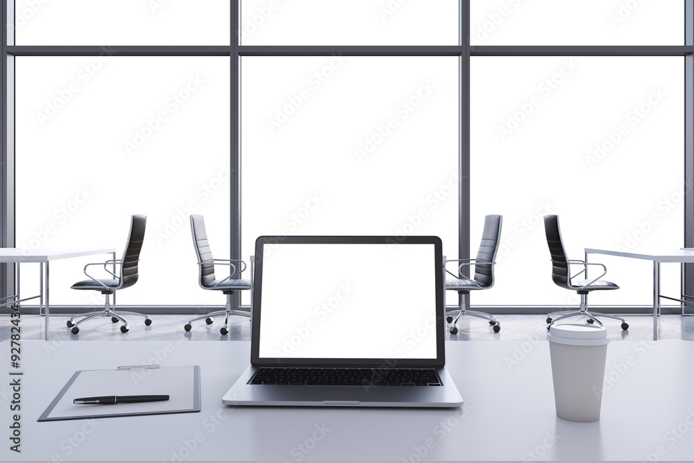 Front view of the workplace in a modern panoramic office with copy ...