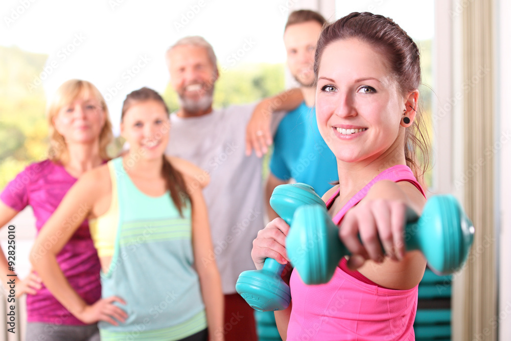 Trainerin mit Sportgruppe Stock-Foto | Adobe Stock