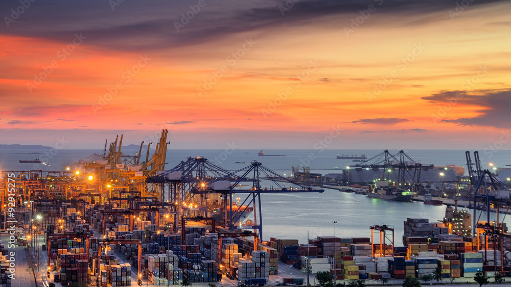Container Cargo freight ship with working crane bridge in shipyard at ...