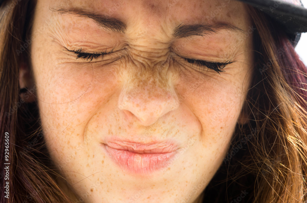 Grimace of a beauty girl - caucasian girl - people concept Stock Photo ...