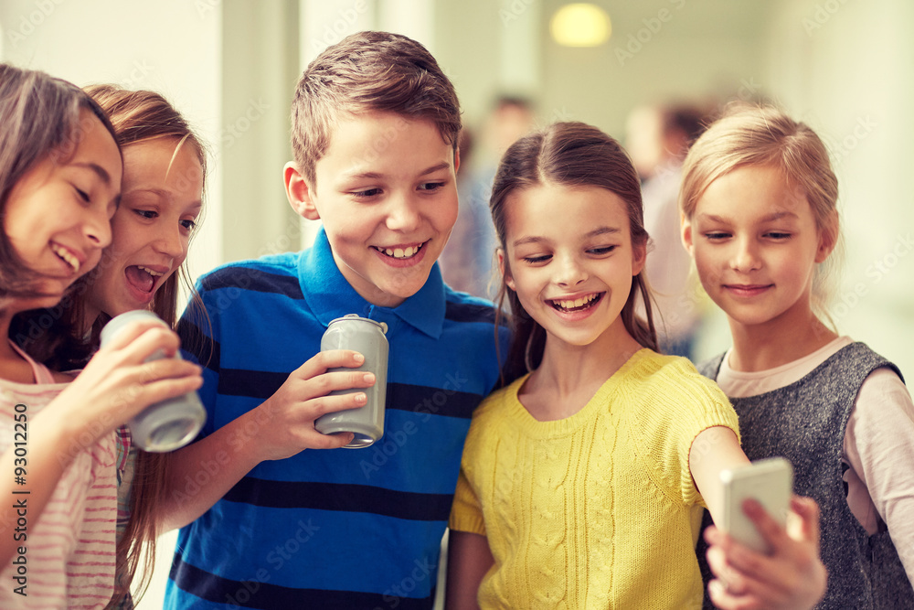 group of school kids with smartphone and soda cans Stock Photo | Adobe ...