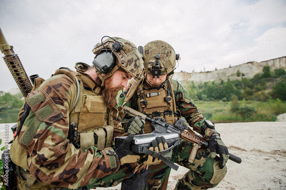 commander of the soldiers paves the route on an electronic table Stock ...