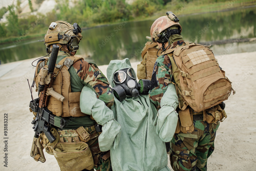 Army rangers captured a scientist with protective mask and prote Stock ...