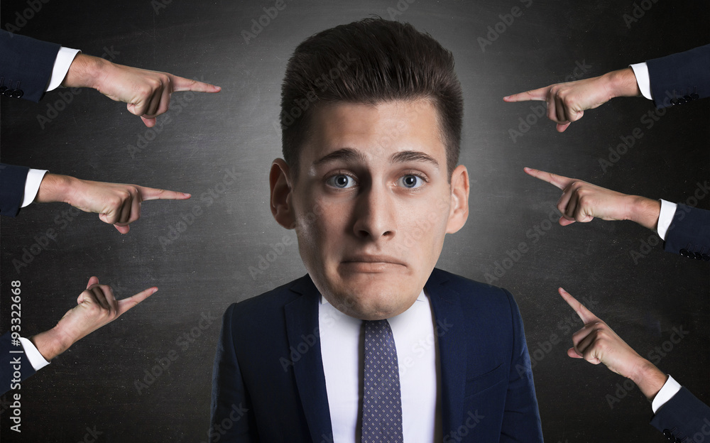 concept of mobbing portrait a young employee with many arms Stock Photo ...