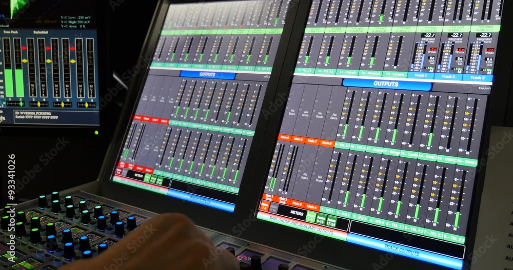 Footage of an audio mixer and monitors showing the audio levels Stock ...