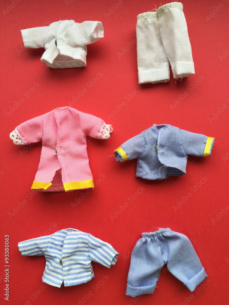 Colorful handmade puppet clothing Stock Photo | Adobe Stock