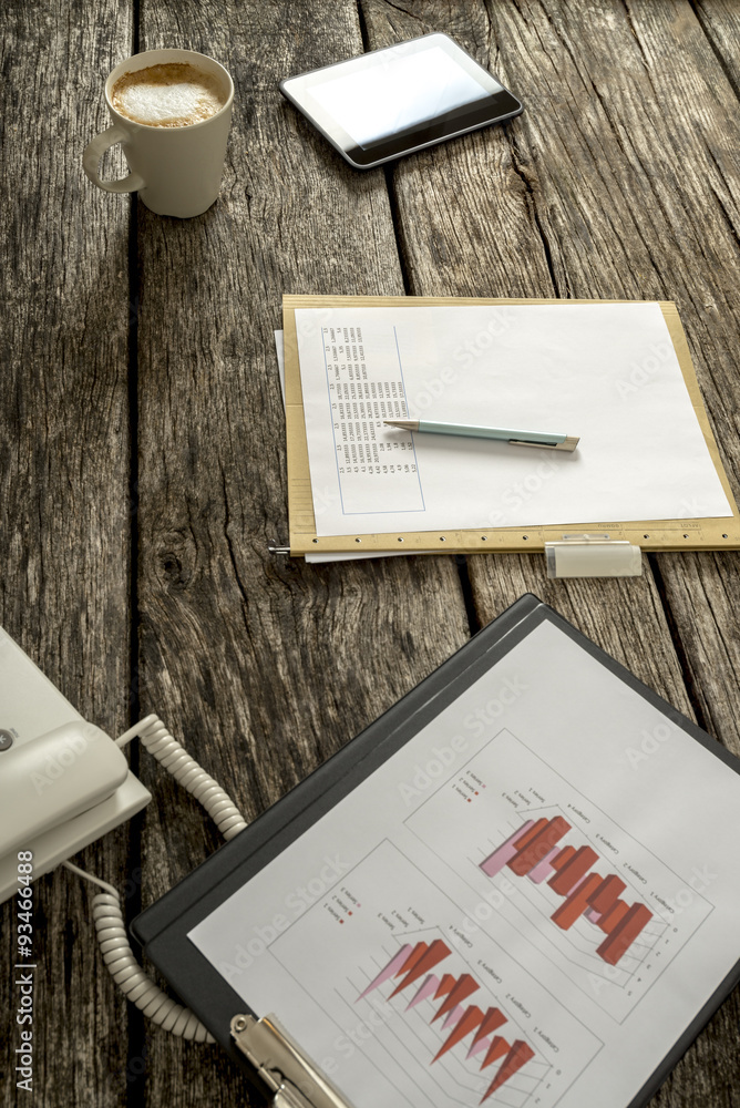 Rustic wooden office desk with paperwork Stock Photo | Adobe Stock
