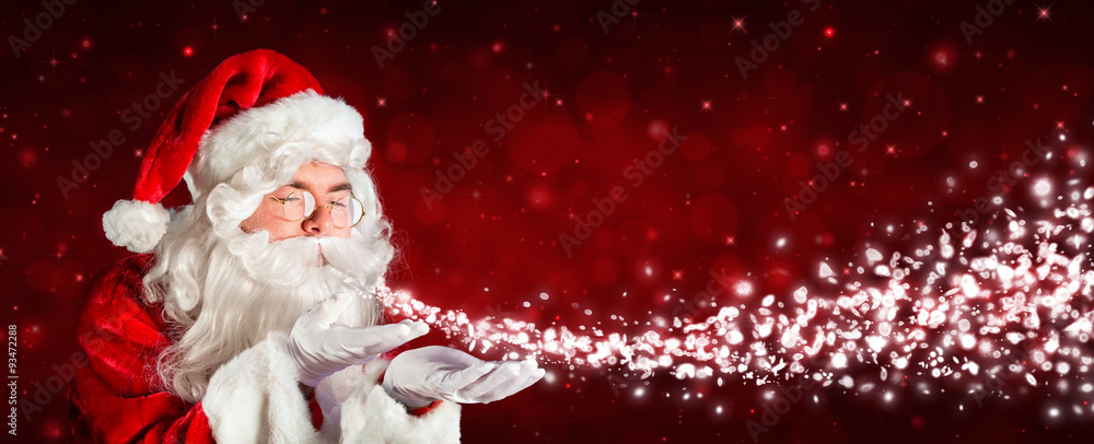Santa Claus Blowing Snow Stock Photo | Adobe Stock
