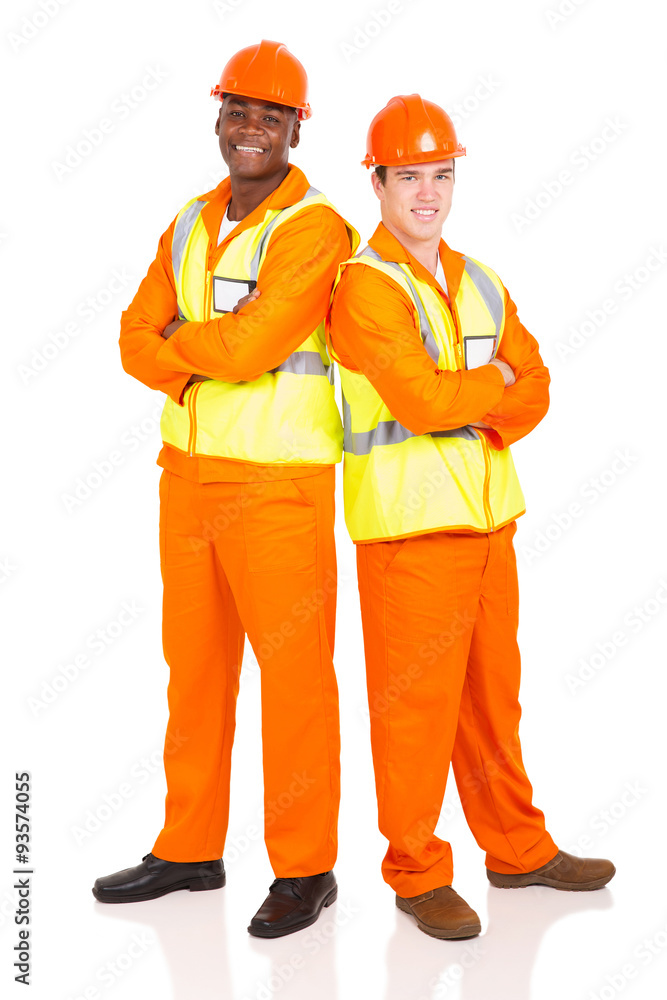 industrial workers standing back to back Stock Photo | Adobe Stock