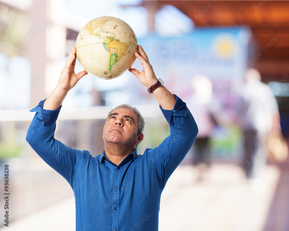 man holding world globe Stock Photo | Adobe Stock