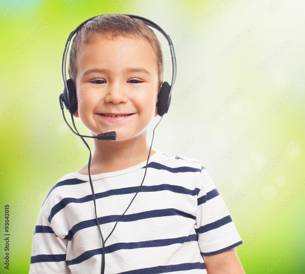 portrait of a little boy using a headset Stock Photo | Adobe Stock