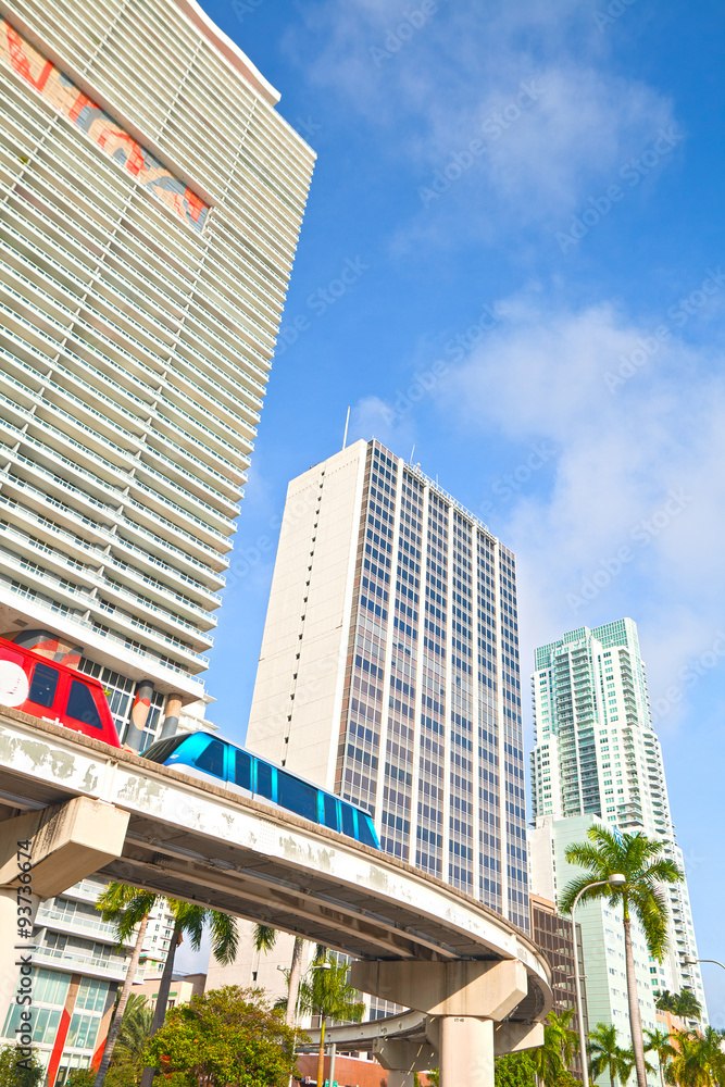 Miami Florida urban downtown scene with city metro mover train and ...