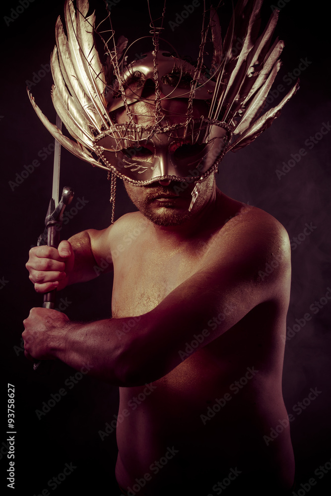 Empire, warrior with golden mask and huge iron sword, body cover Stock ...