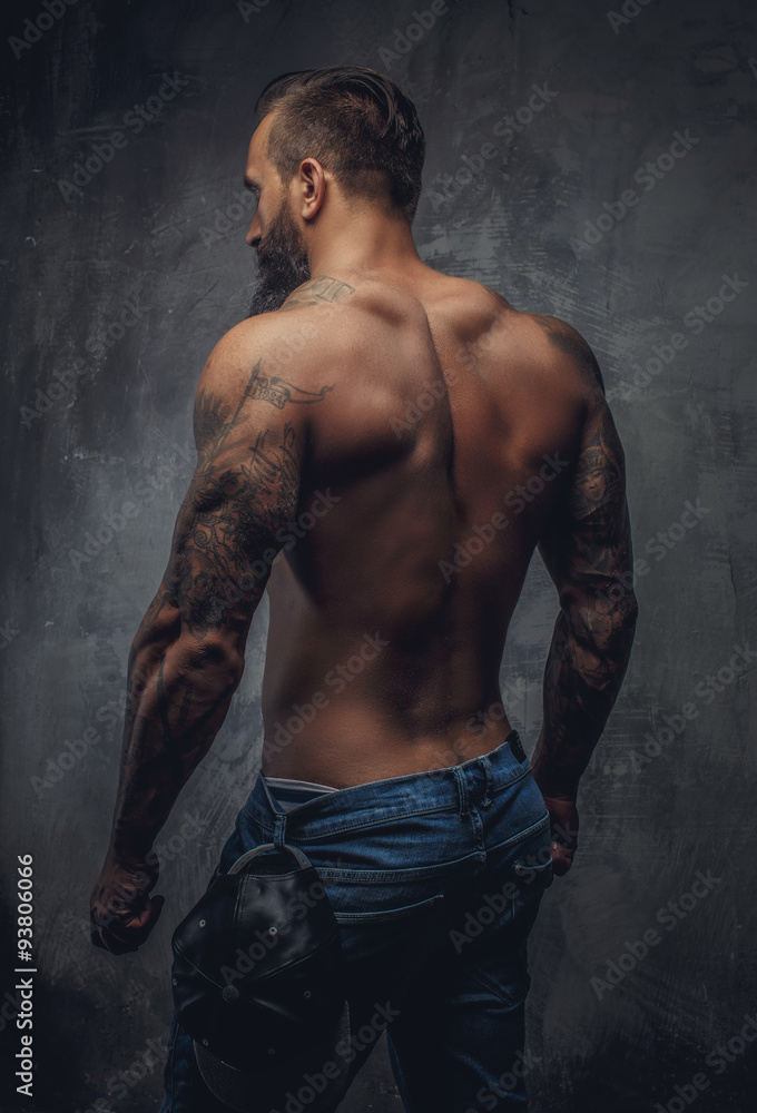 Shirtless muscular guy from back. Stock Photo | Adobe Stock
