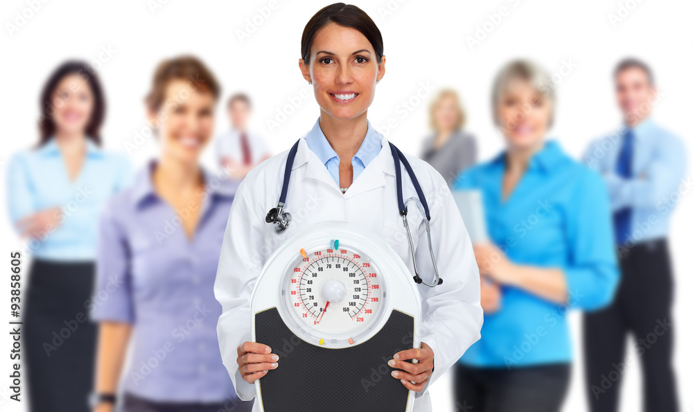 Medical doctor woman with scales. Stock Photo | Adobe Stock