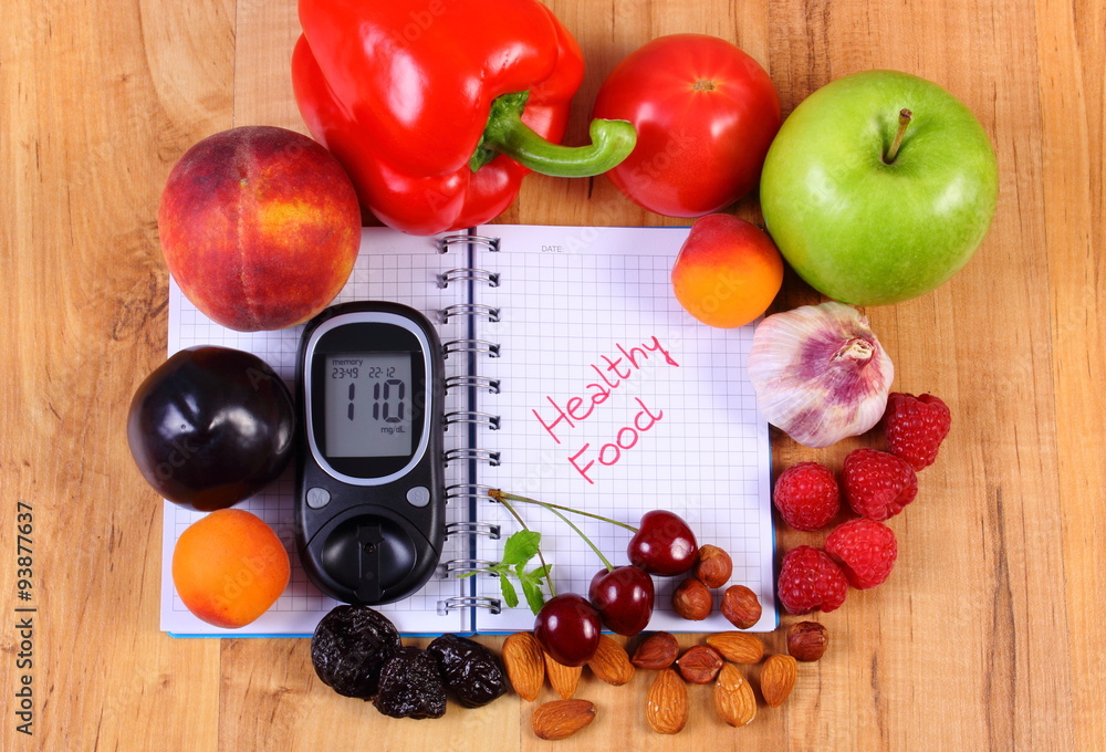 Fruits and vegetables with glucometer and notebook for notes, healthy ...