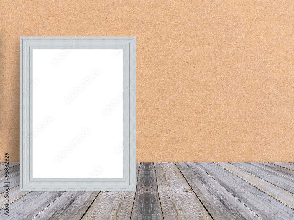 Blank white wooden photo frame at tropical plank wooden floor and wall ...