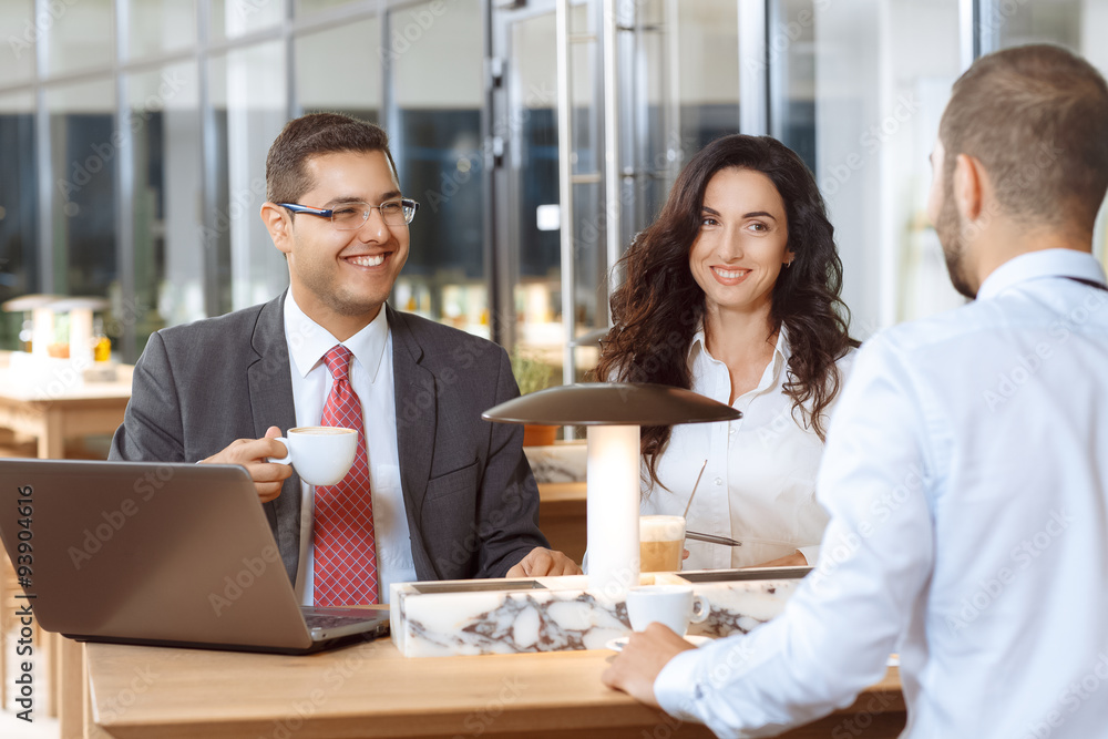 Business colleagues having friendly conversation Stock Photo | Adobe Stock