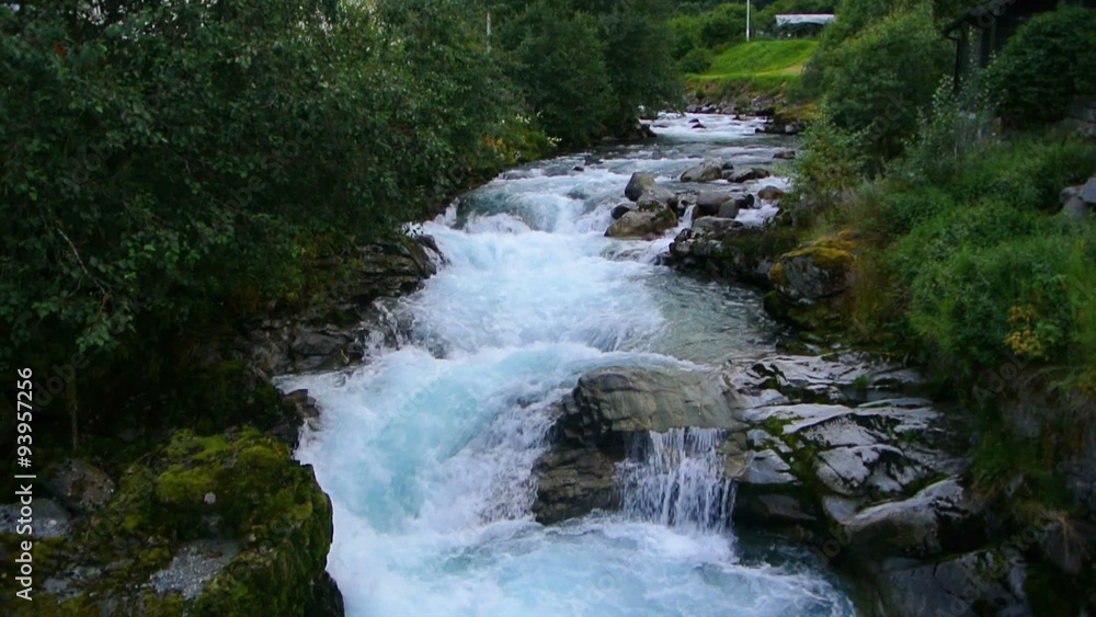 Water running down the mountain in Norway. Stock Video | Adobe Stock