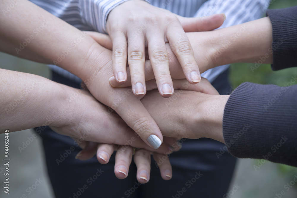 Stack of hands gathering in unity. Stock Photo | Adobe Stock