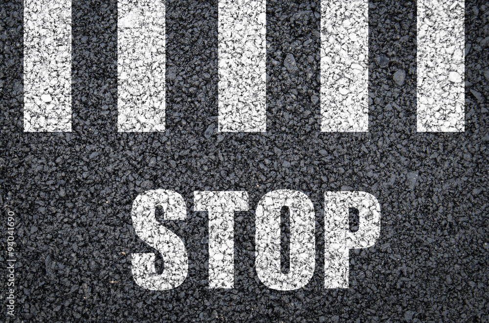 Pedestrian crossing road marking with stop sign Stock Photo | Adobe Stock