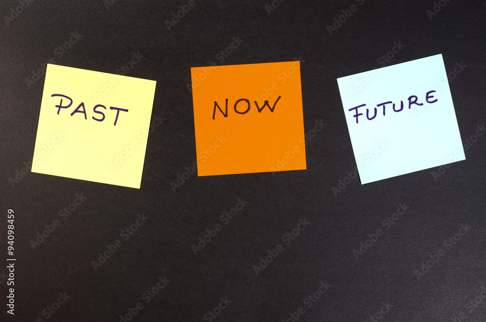 Past, present and future concept. Colored notes on a black background ...