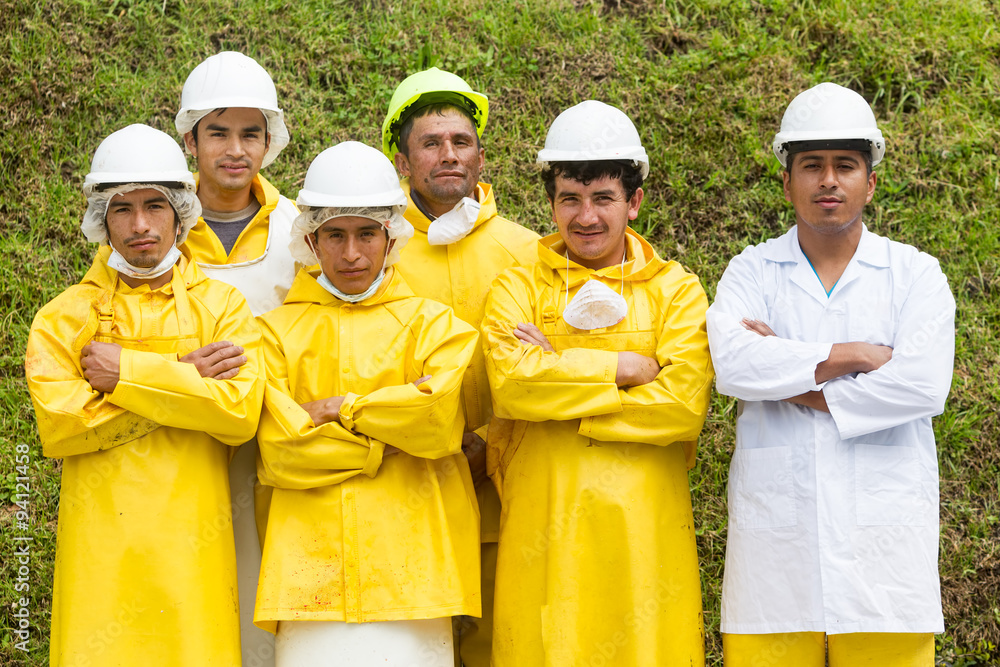 slaughterhouse team of slaughterhouse workers or butchers and ...