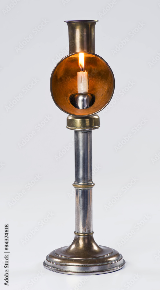 Antique spring loaded Candlestick made in the 19th century. Stock Photo ...
