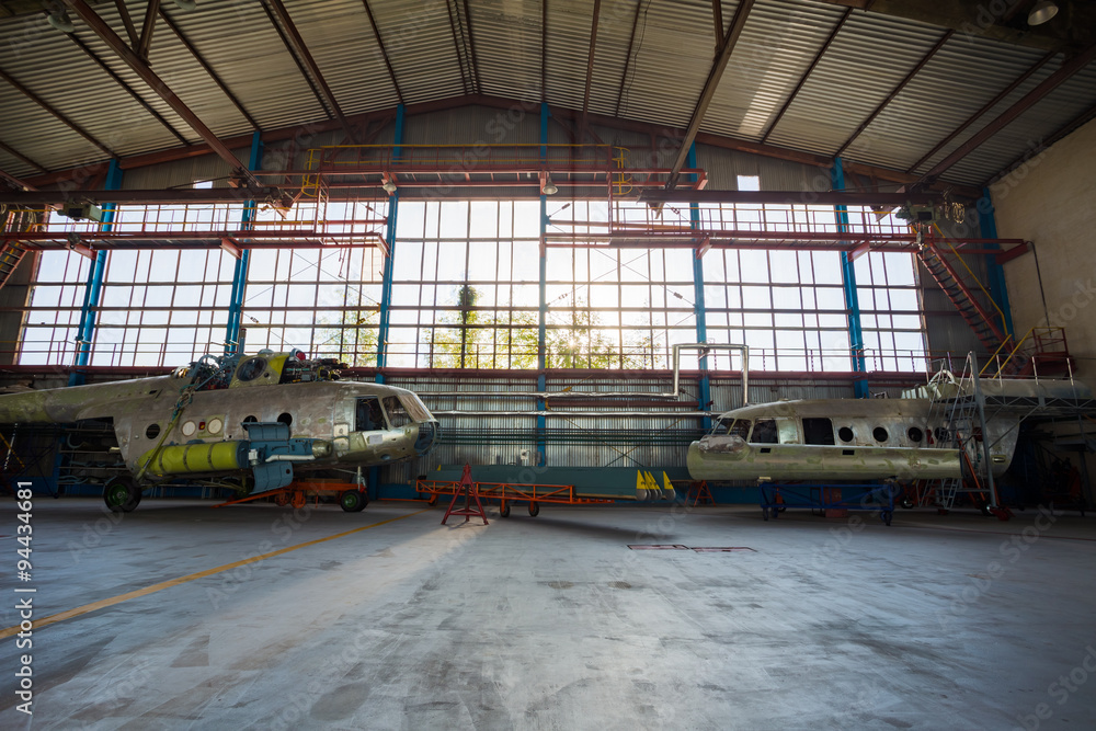 Maintenance of helicoptes in the hangar Stock Photo | Adobe Stock