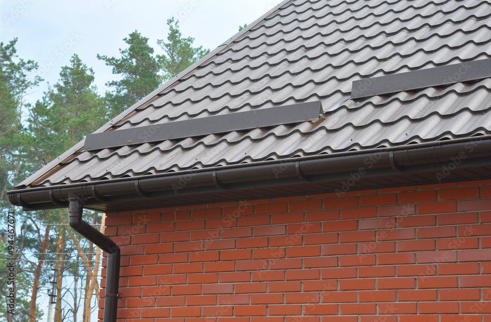 Closeup on New Rain Gutter System, Downspout, Drain Pipe and Roof ...