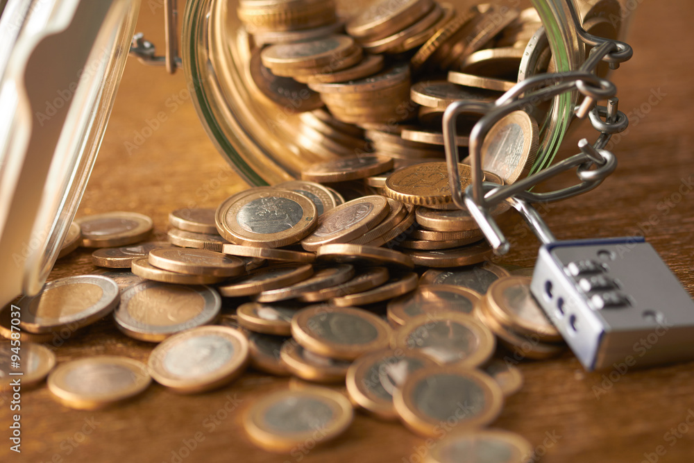 jar with coins Stock Photo | Adobe Stock