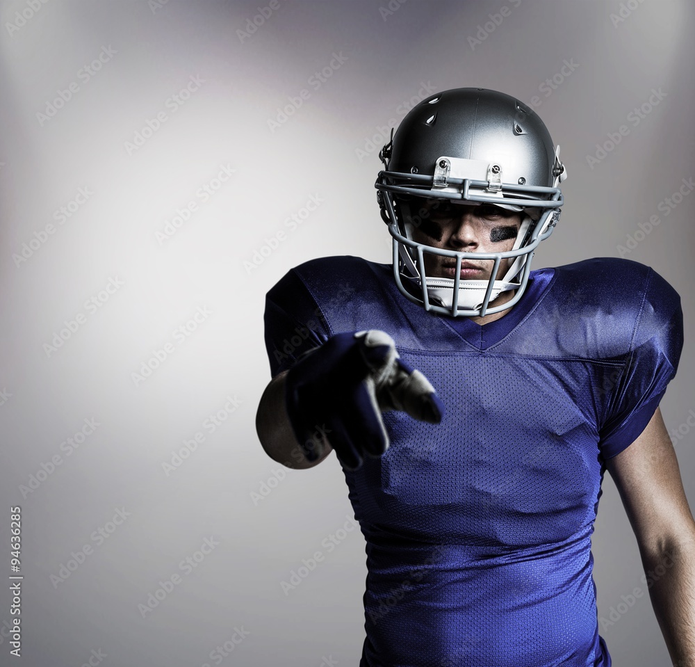 Composite image of american football player pointing | Uwalls.co.uk