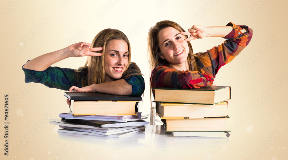 Students doing victory gesture Stock Photo | Adobe Stock